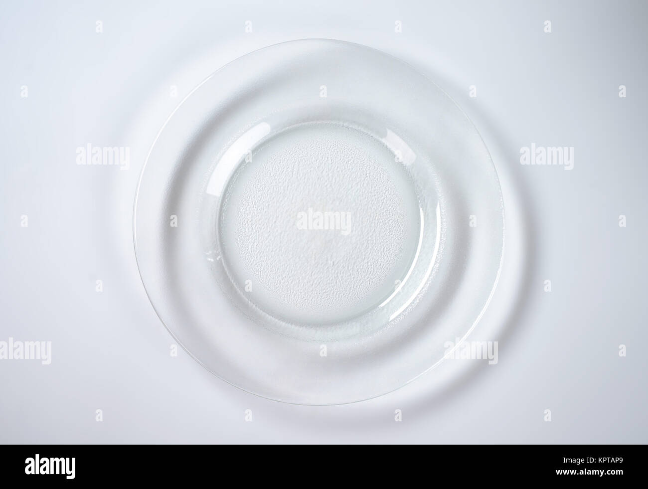 empty glass plate with wide rim Stock Photo - Alamy