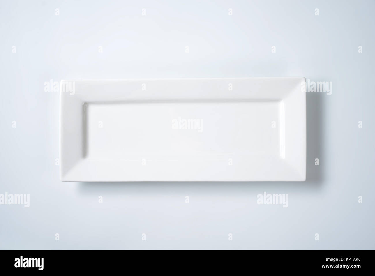 white rectangular plate with rim Stock Photo - Alamy