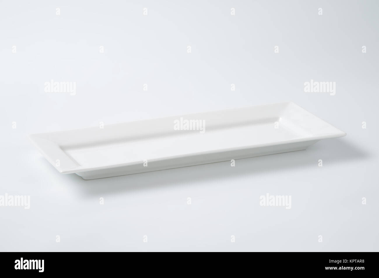 white rectangular plate with rim Stock Photo - Alamy