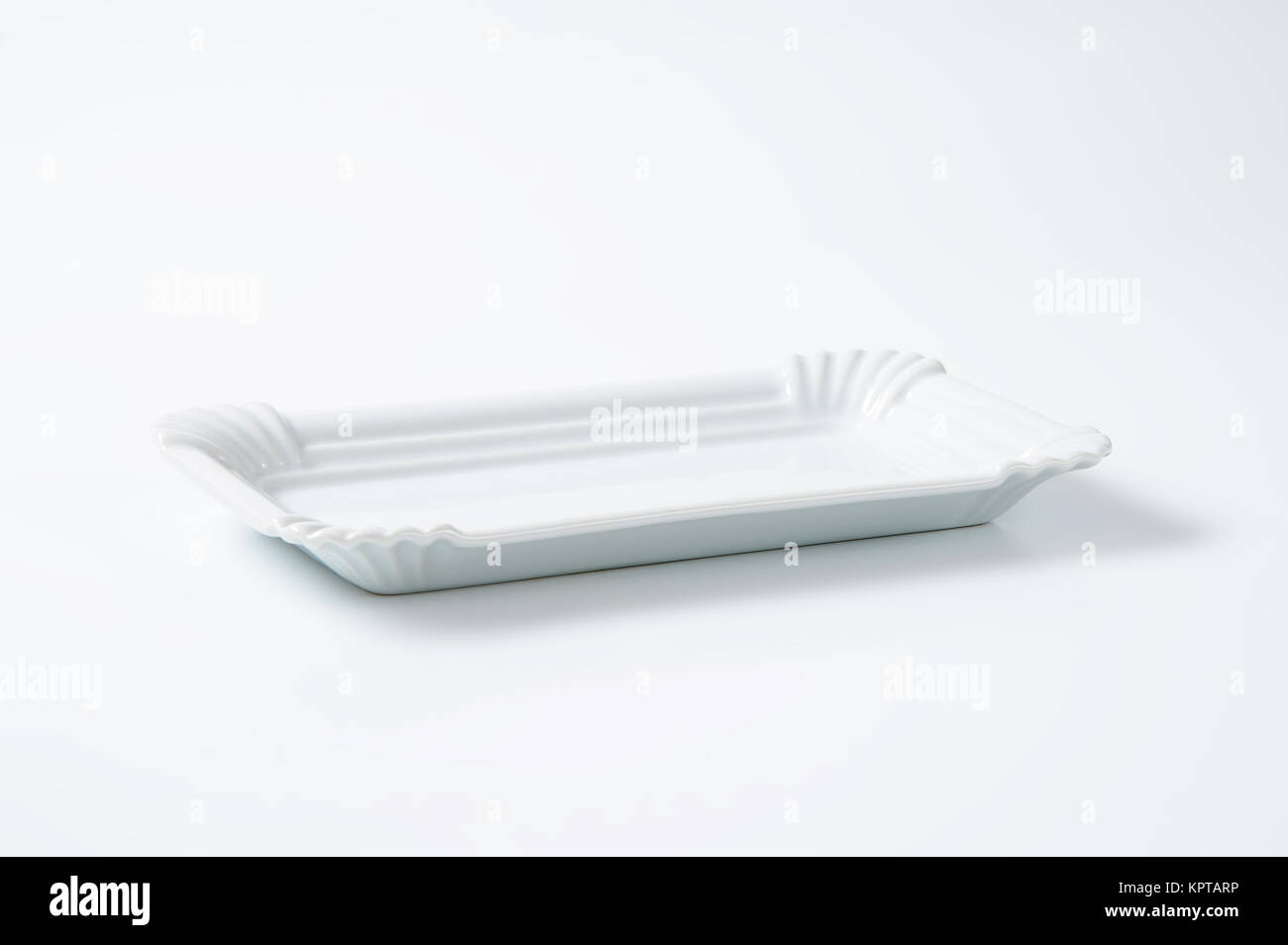 white rectangular plate with decorative rim Stock Photo - Alamy