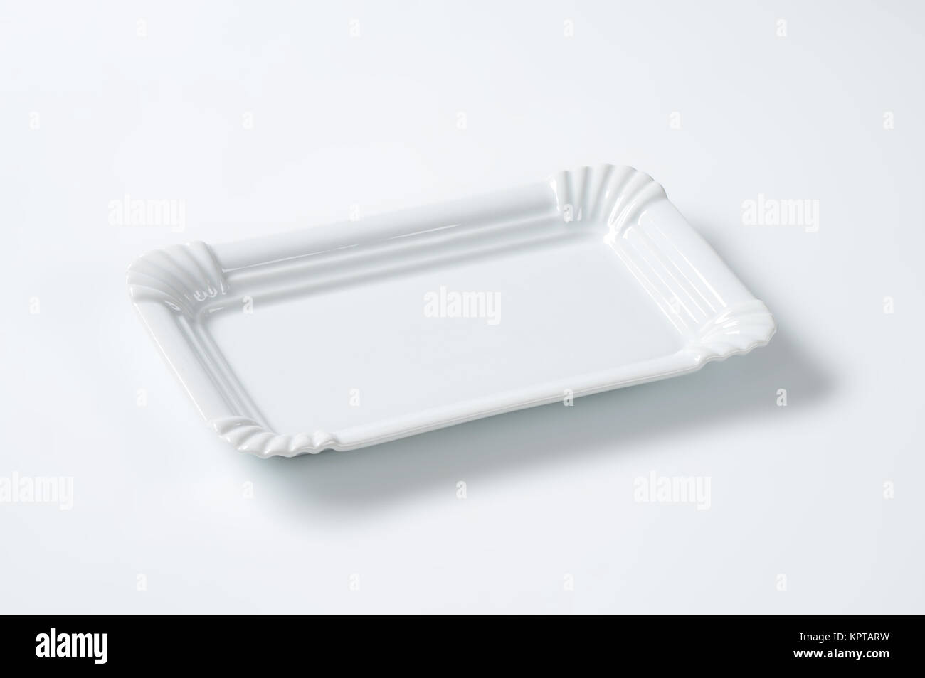 white rectangular plate with decorative rim Stock Photo - Alamy