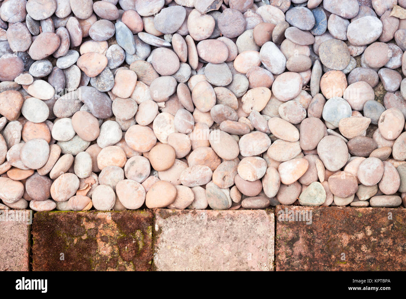 Pebble stones and bricks abstract background, stock photo Stock Photo ...