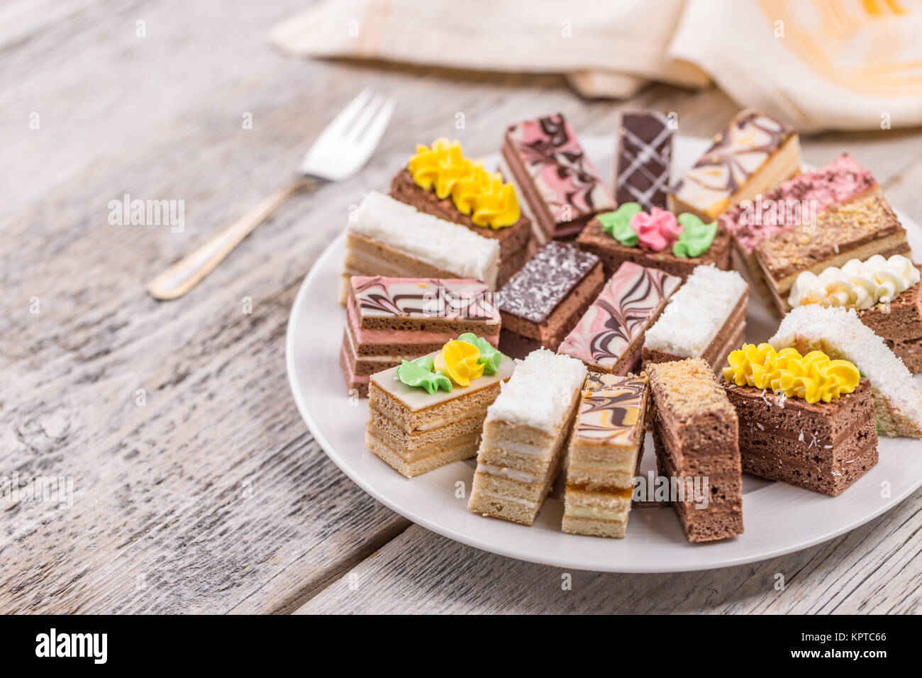 Different sort of beautiful layered pastries Stock Photo - Alamy