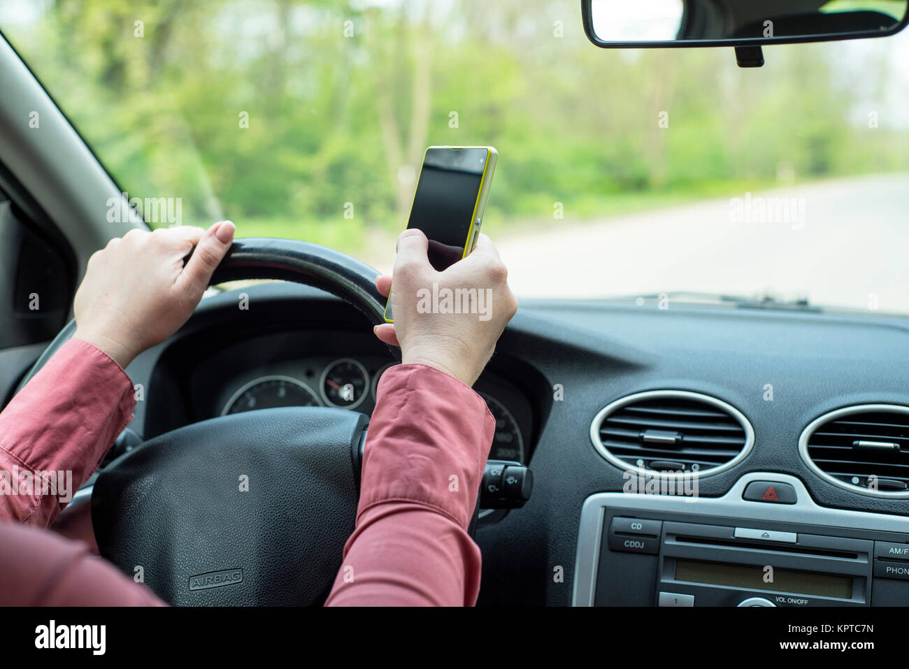 image depicting a woman riding in a car and talking on the phone Stock ...