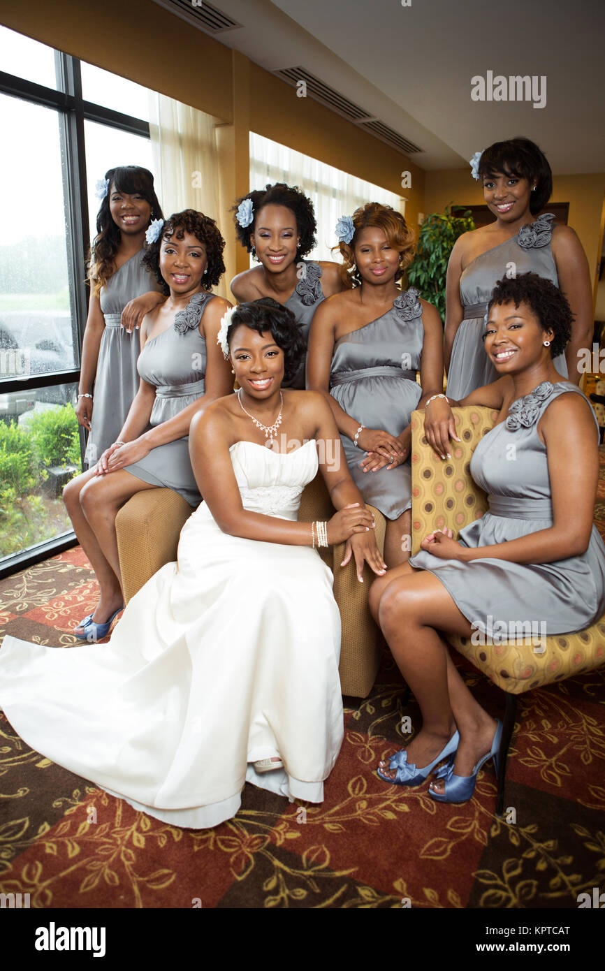 Bride getting dressed hi-res stock photography and images - Alamy