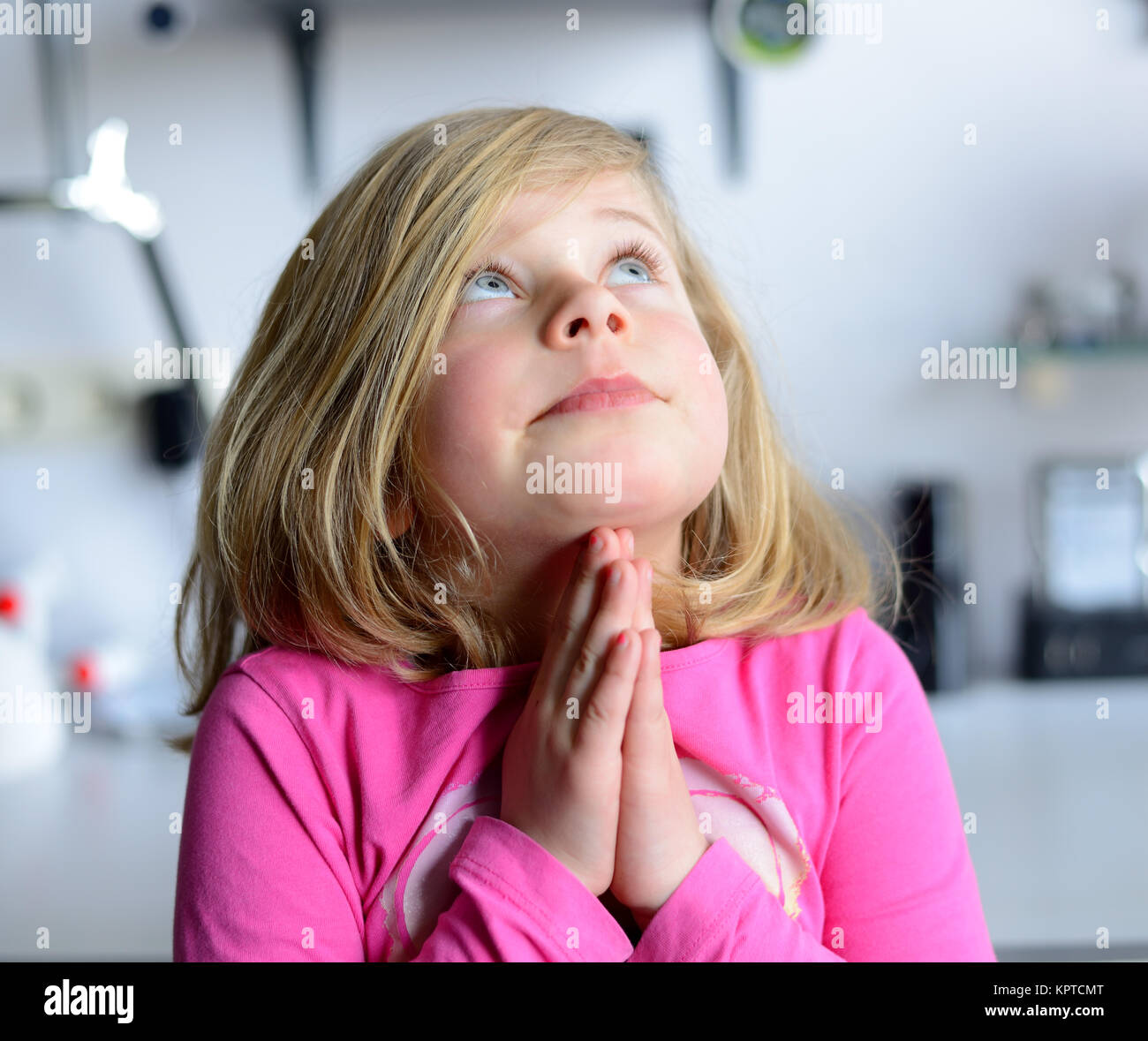 little girl is praying Stock Photo - Alamy