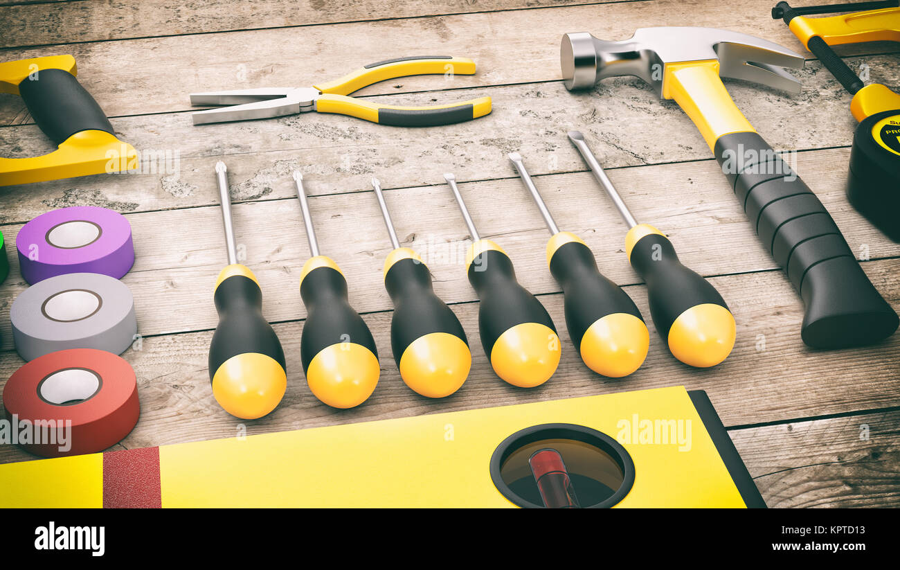 close-up view of a kit of work tools on wooden background, concept of ...