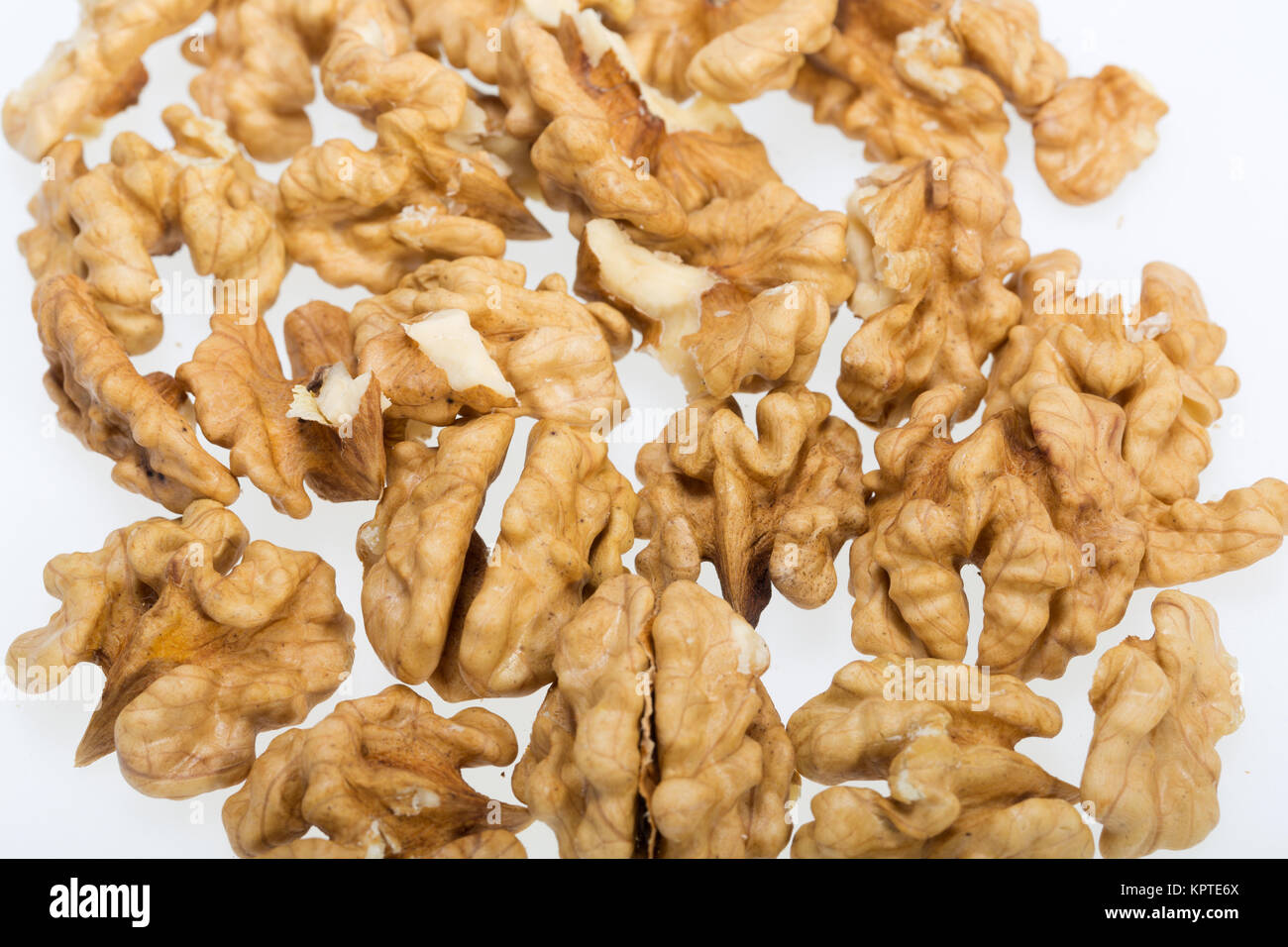 cracked walnut isolated on the white background Stock Photo - Alamy