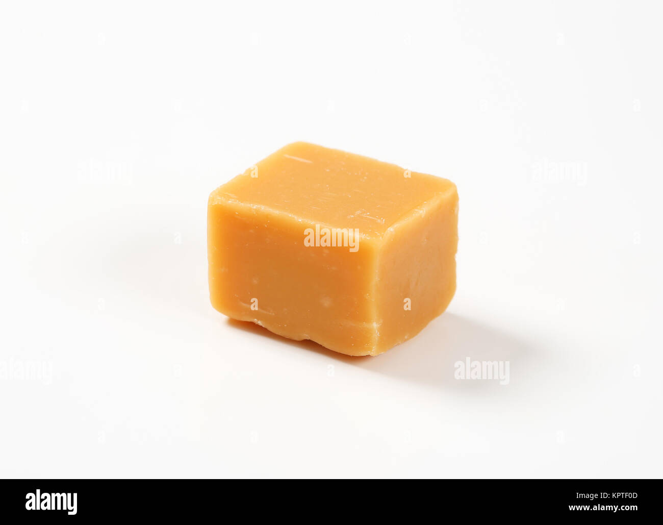 cube shaped chewy toffee candy Stock Photo - Alamy
