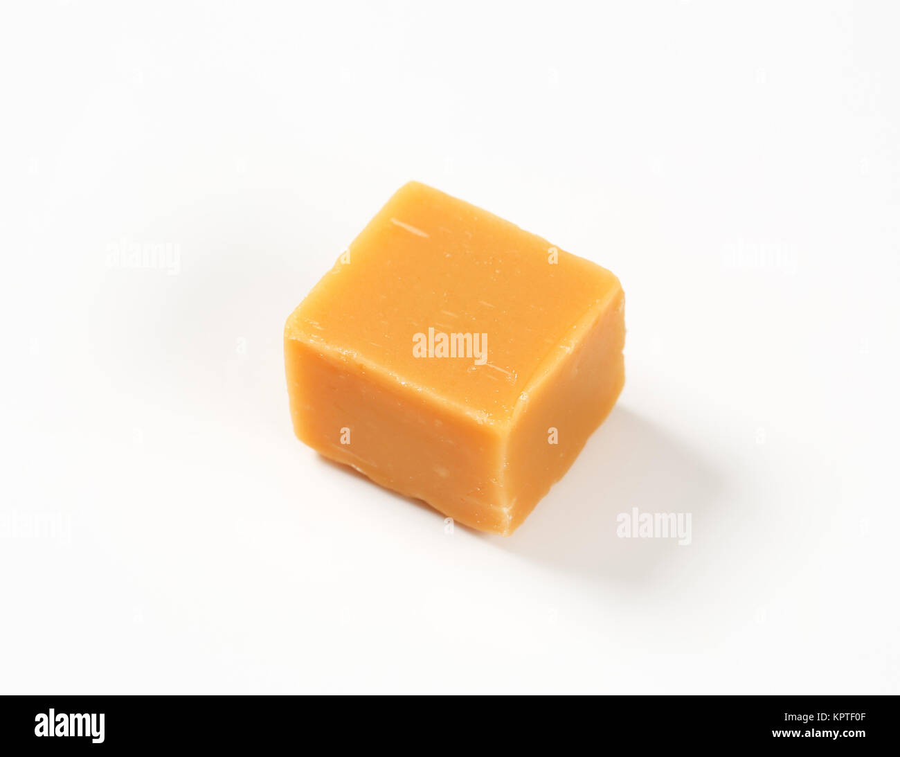 cube shaped chewy toffee candy Stock Photo - Alamy