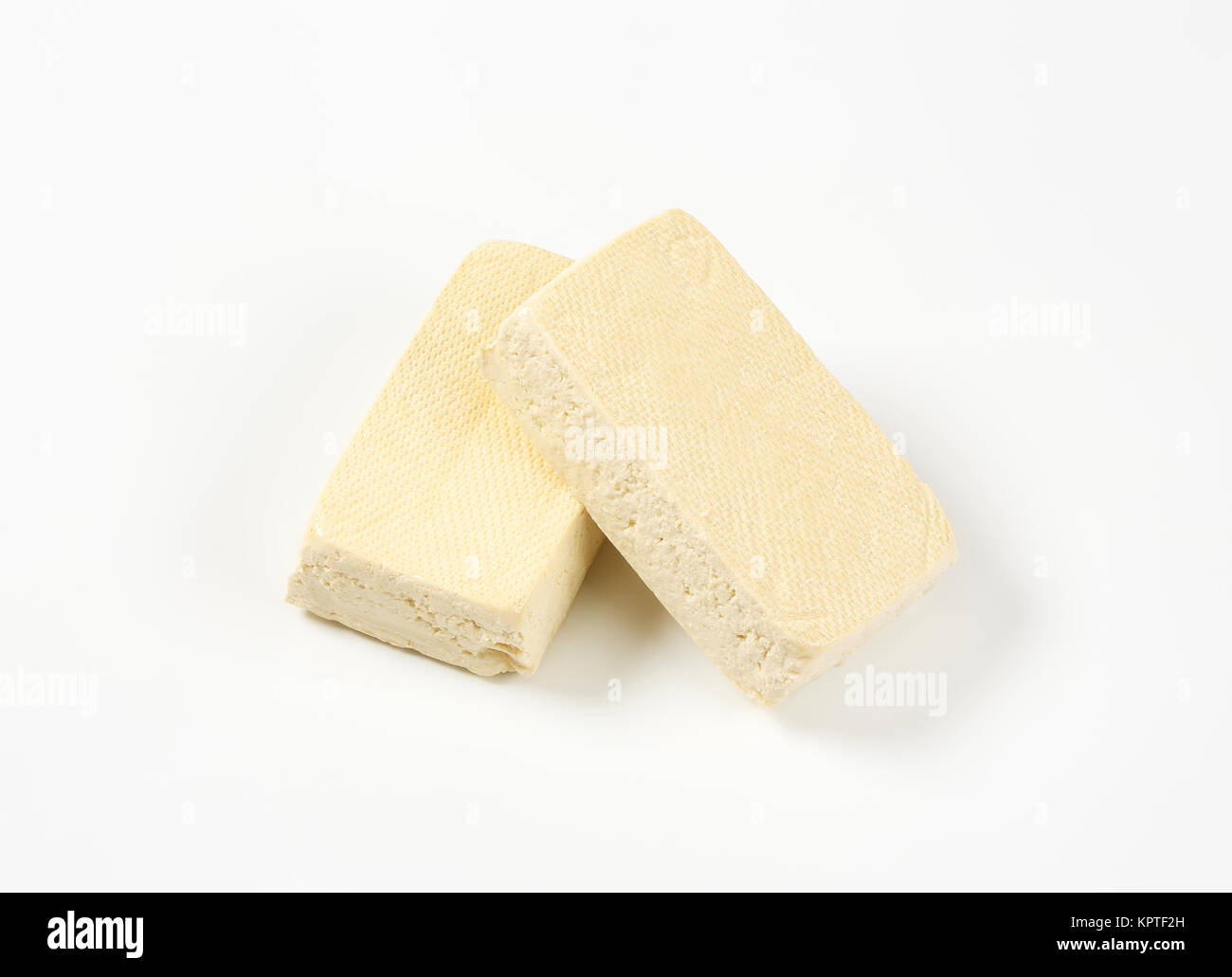 Two blocks of firm tofu (soybean curd Stock Photo - Alamy
