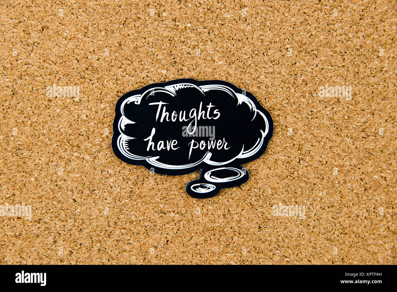 Thoughts Have Power written on black thinking bubble over cork board ...
