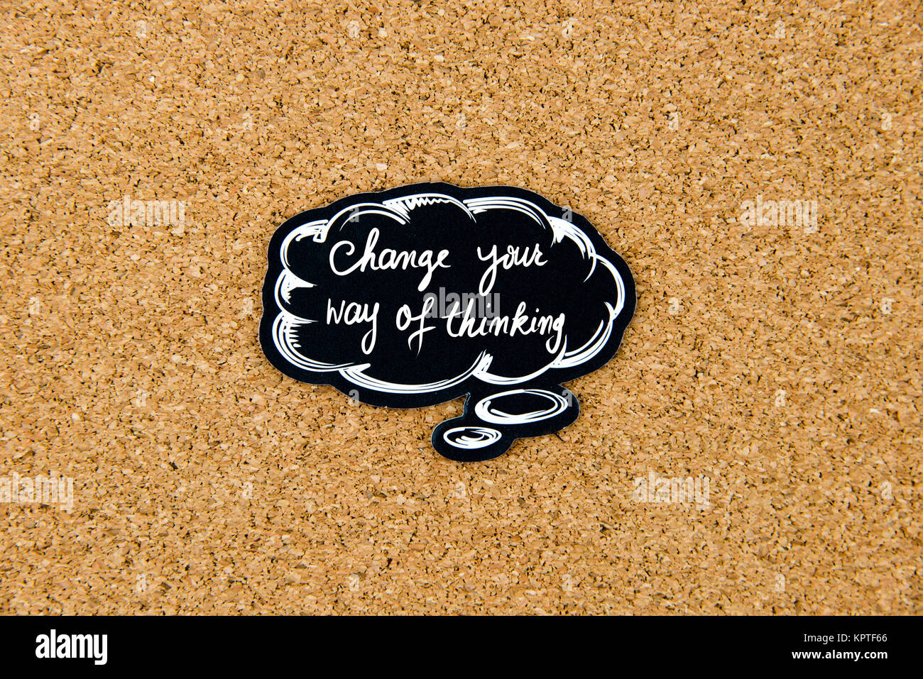 Change Your Way Of Thinking written on black thinking bubble over cork ...