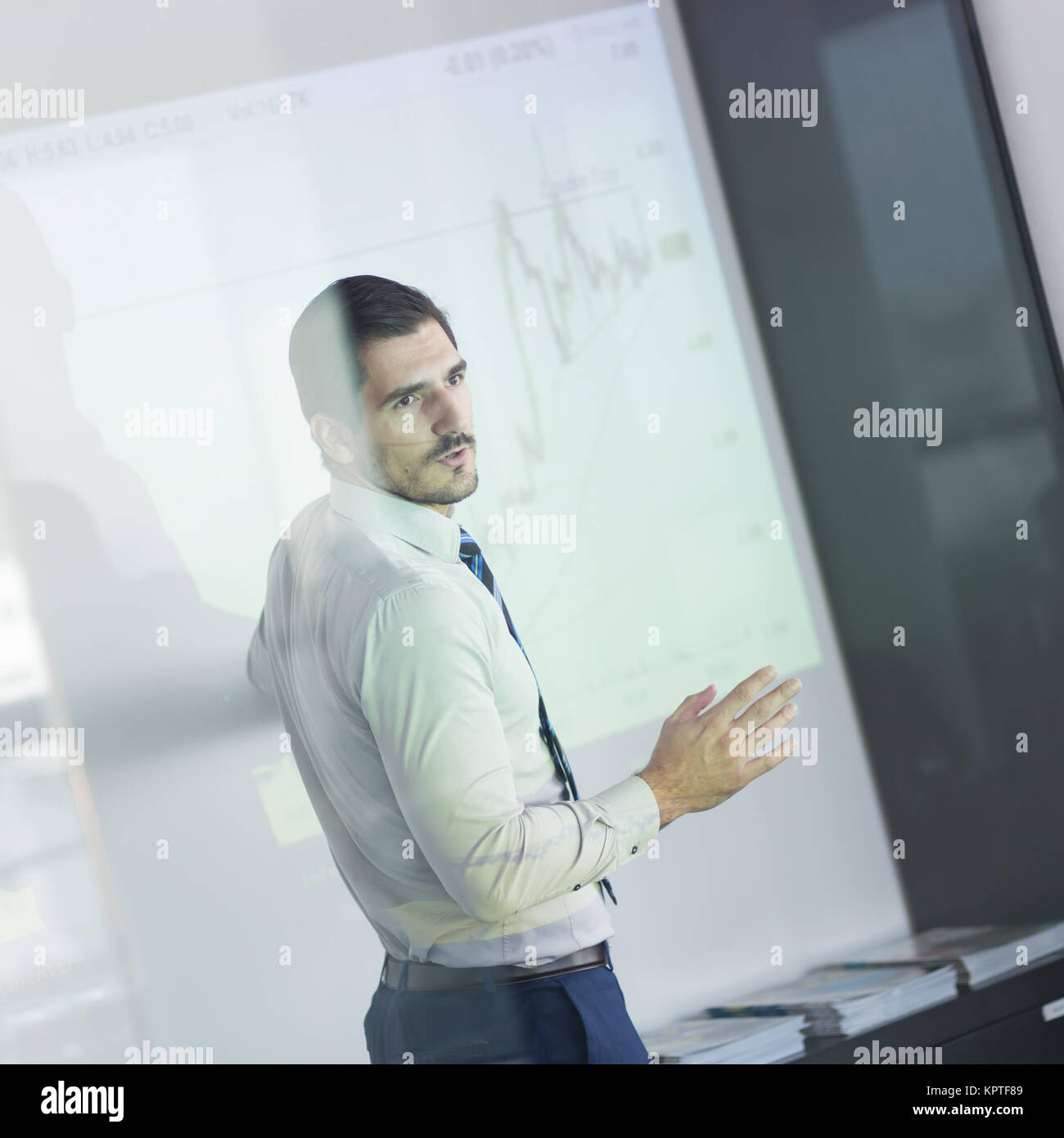 Business man making a presentation in front of whiteboard. Business ...
