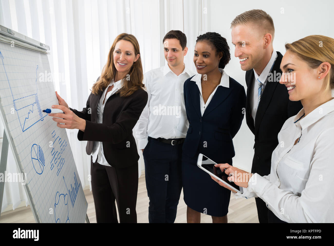 Manager Explaining Business Strategy To The Staffs Stock Photo - Alamy