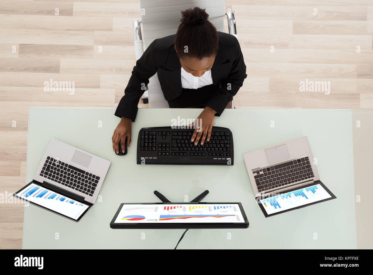 Young African Businesswoman Analyzing Graph Stock Photo - Alamy Young African Businesswoman Analyzing Graph Stock Photo - Alamy