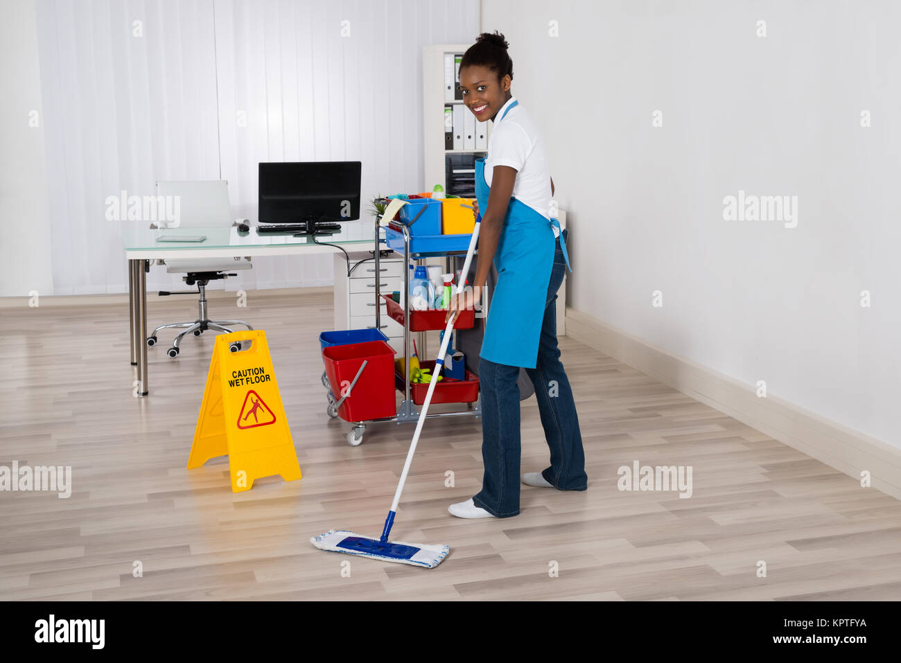 Janitor Mopping Floor