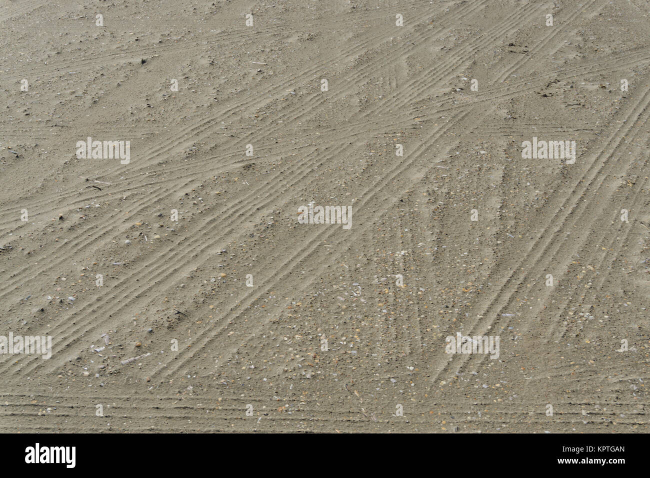 Tire tracks in the sand Stock Photo - Alamy