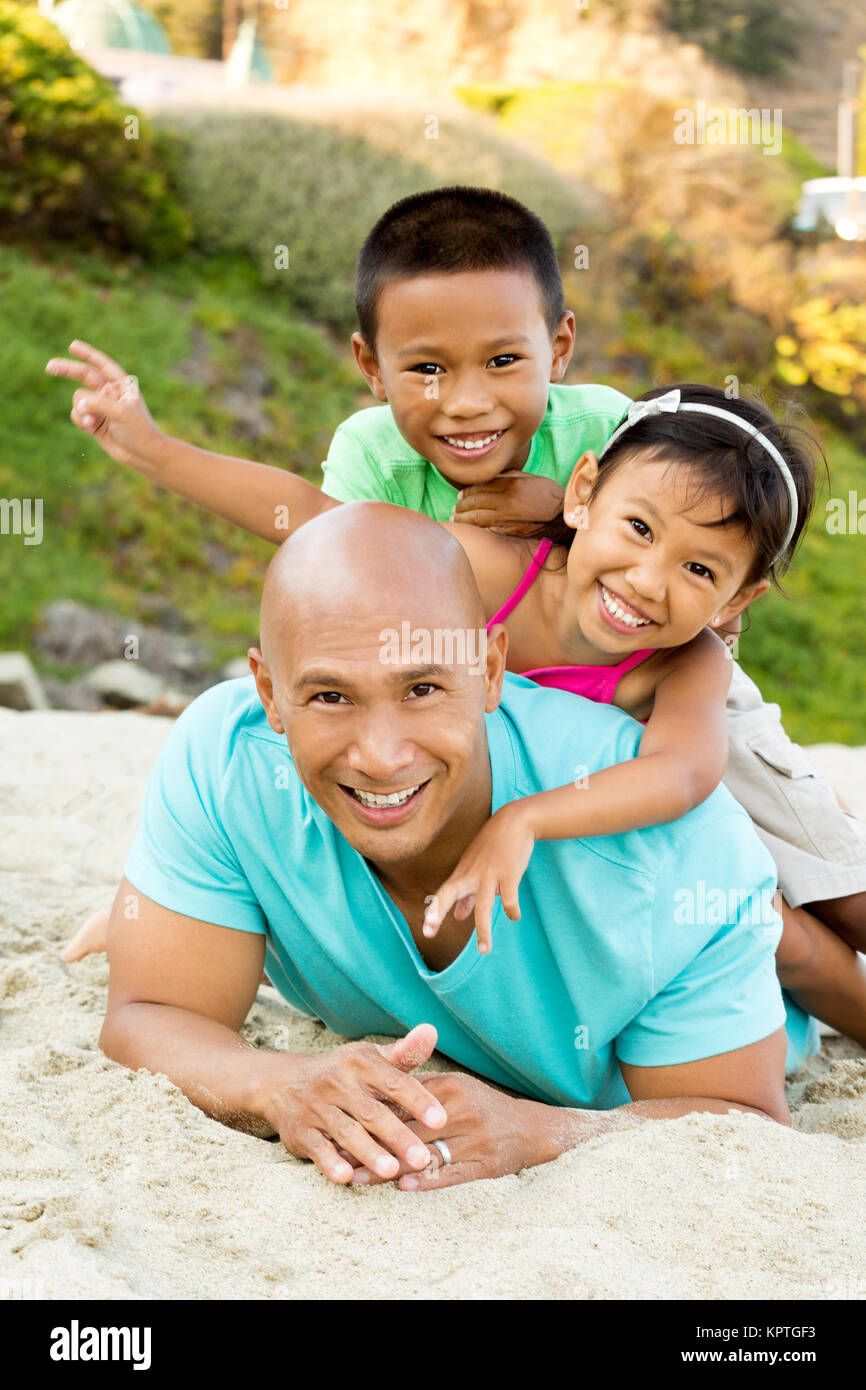 Group of kids playing on the beach hi-res stock photography and images ...