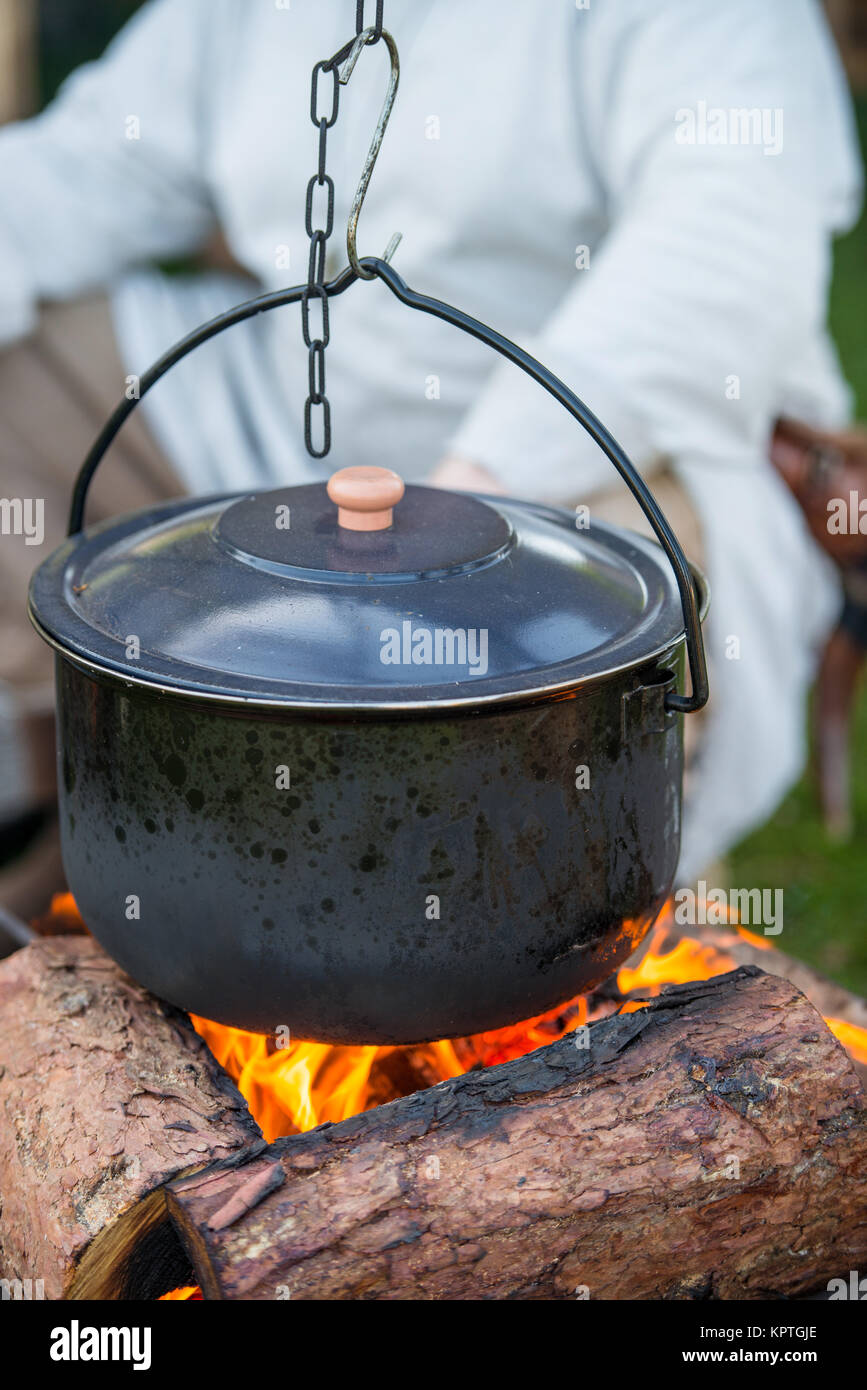 boiling over the fire Stock Photo - Alamy