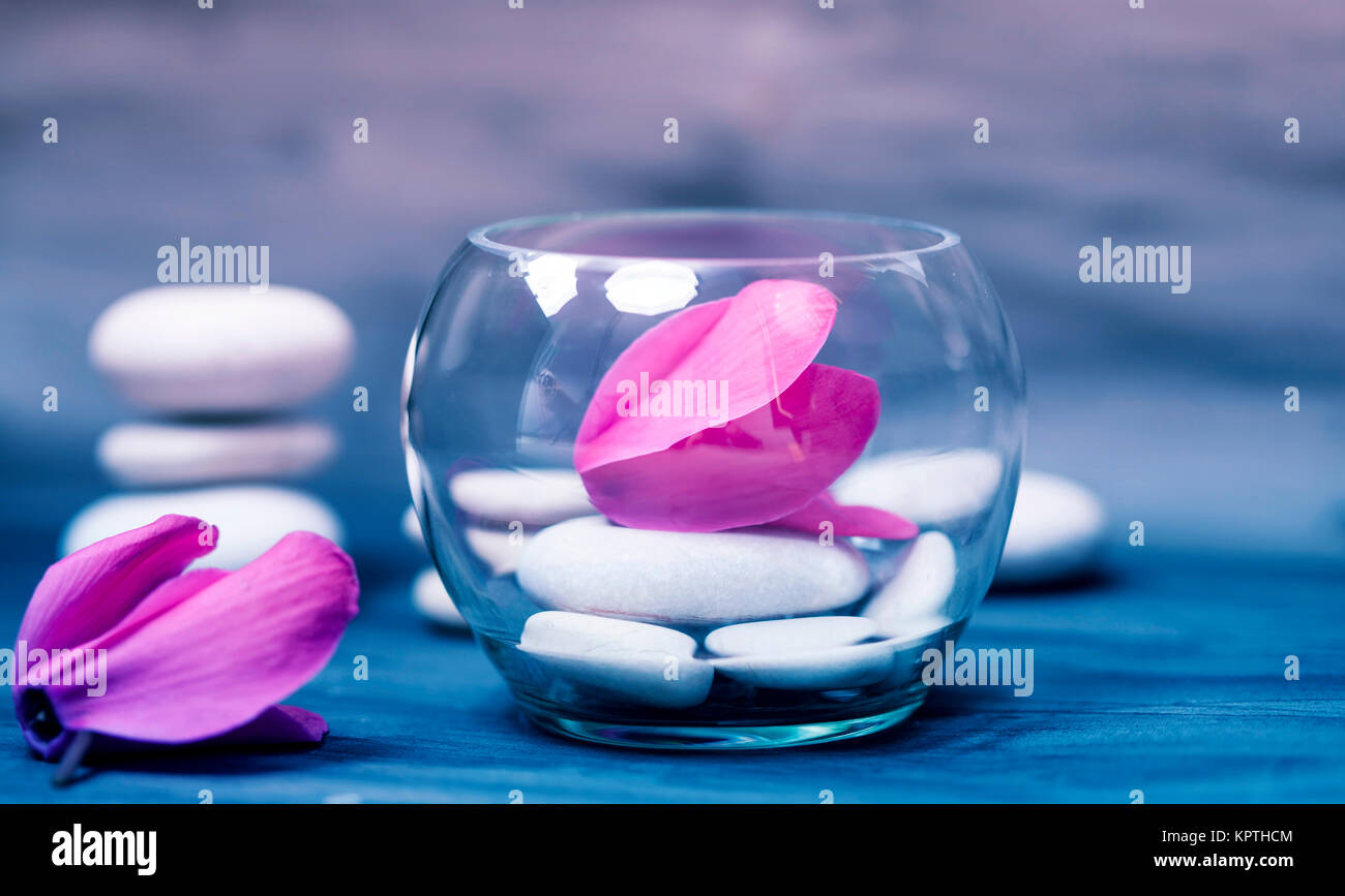 White zen stones on painted background Stock Photo - Alamy