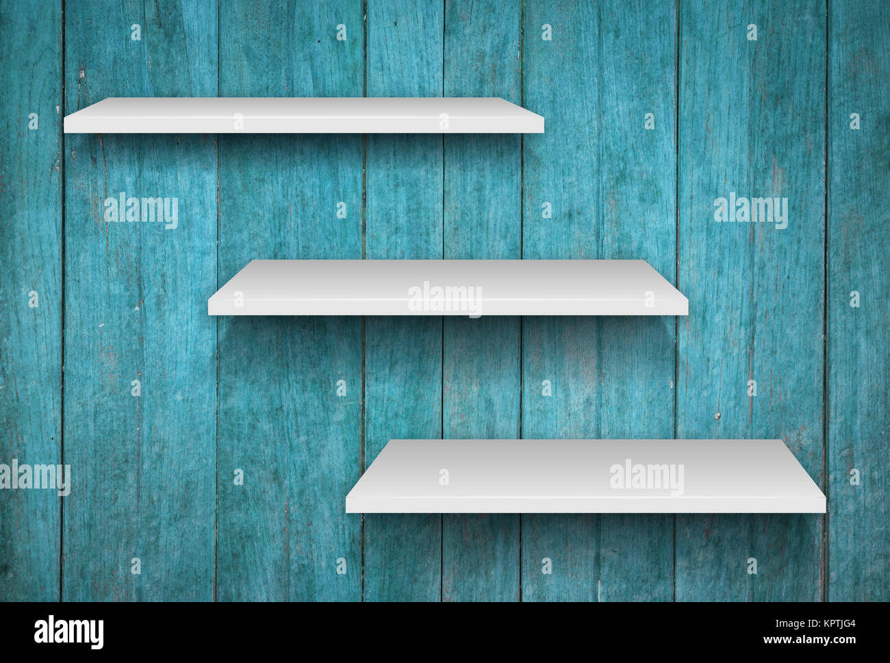 Three white shelves on blue wooden texture background Stock Photo - Alamy