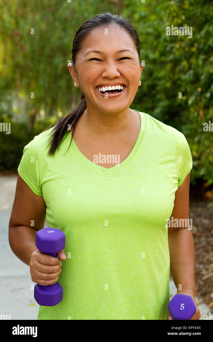 Healthy woman exercising and getting fit Stock Photo - Alamy