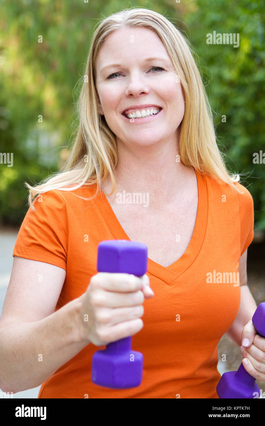 Healthy woman exercising and getting fit Stock Photo - Alamy