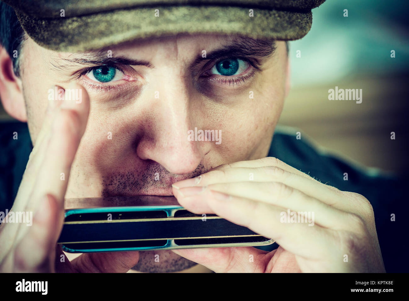 Musician plays the harmonica hi-res stock photography and images - Alamy