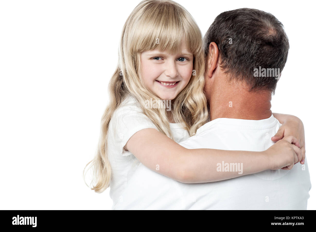 Little girl smiling over her fathers shoulder Stock Photo - Alamy