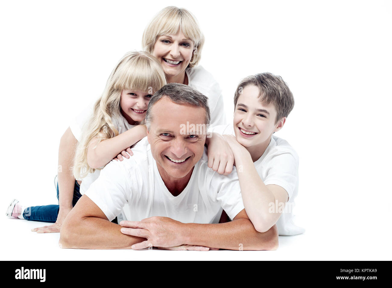 Sweet family having fun on the floor Stock Photo - Alamy