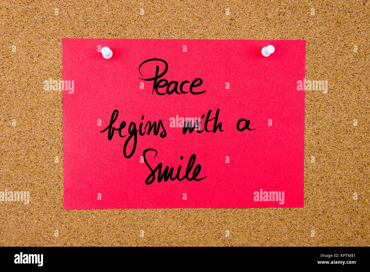 Red paper note with handwritten text on cork board Stock Photo - Alamy