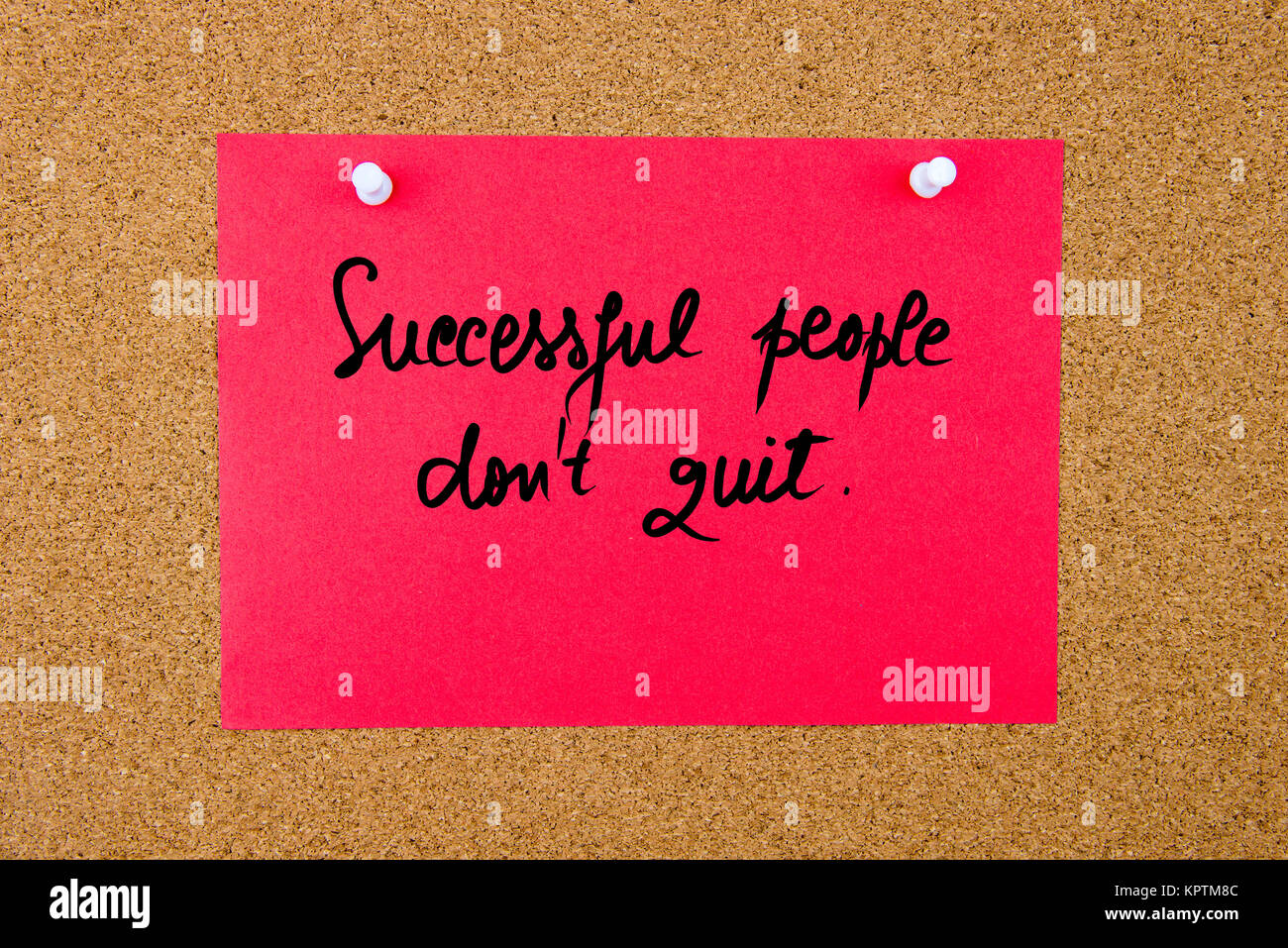 Red paper note with handwritten text on cork board Stock Photo - Alamy