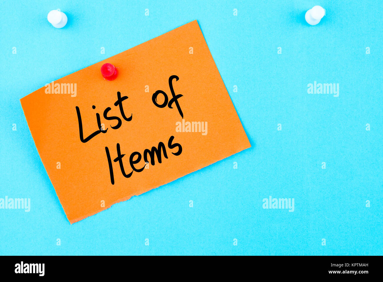 List Of Items written on orange paper note Stock Photo - Alamy