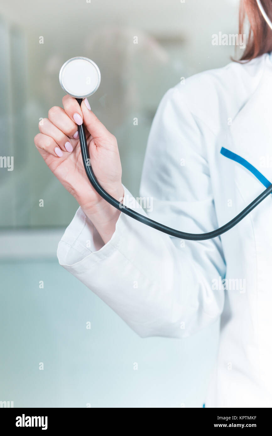 Doctor with a stethoscope in the hands Stock Photo - Alamy