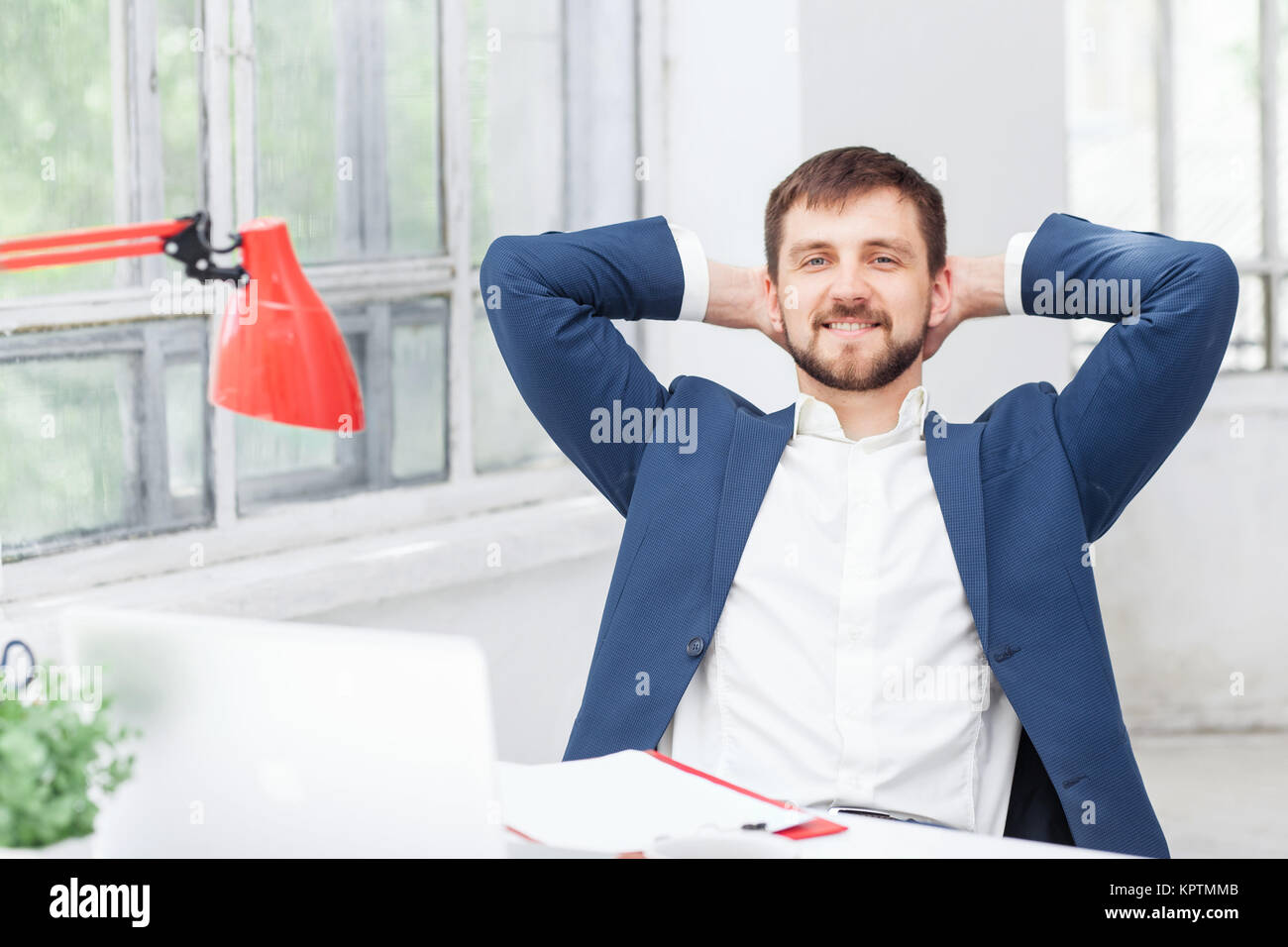 The male office worker resting Stock Photo - Alamy