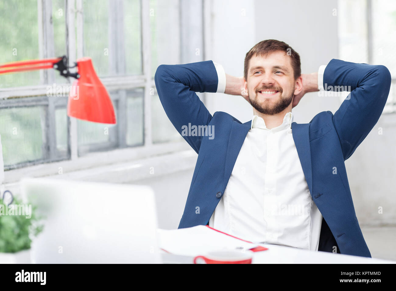 The male office worker resting Stock Photo - Alamy
