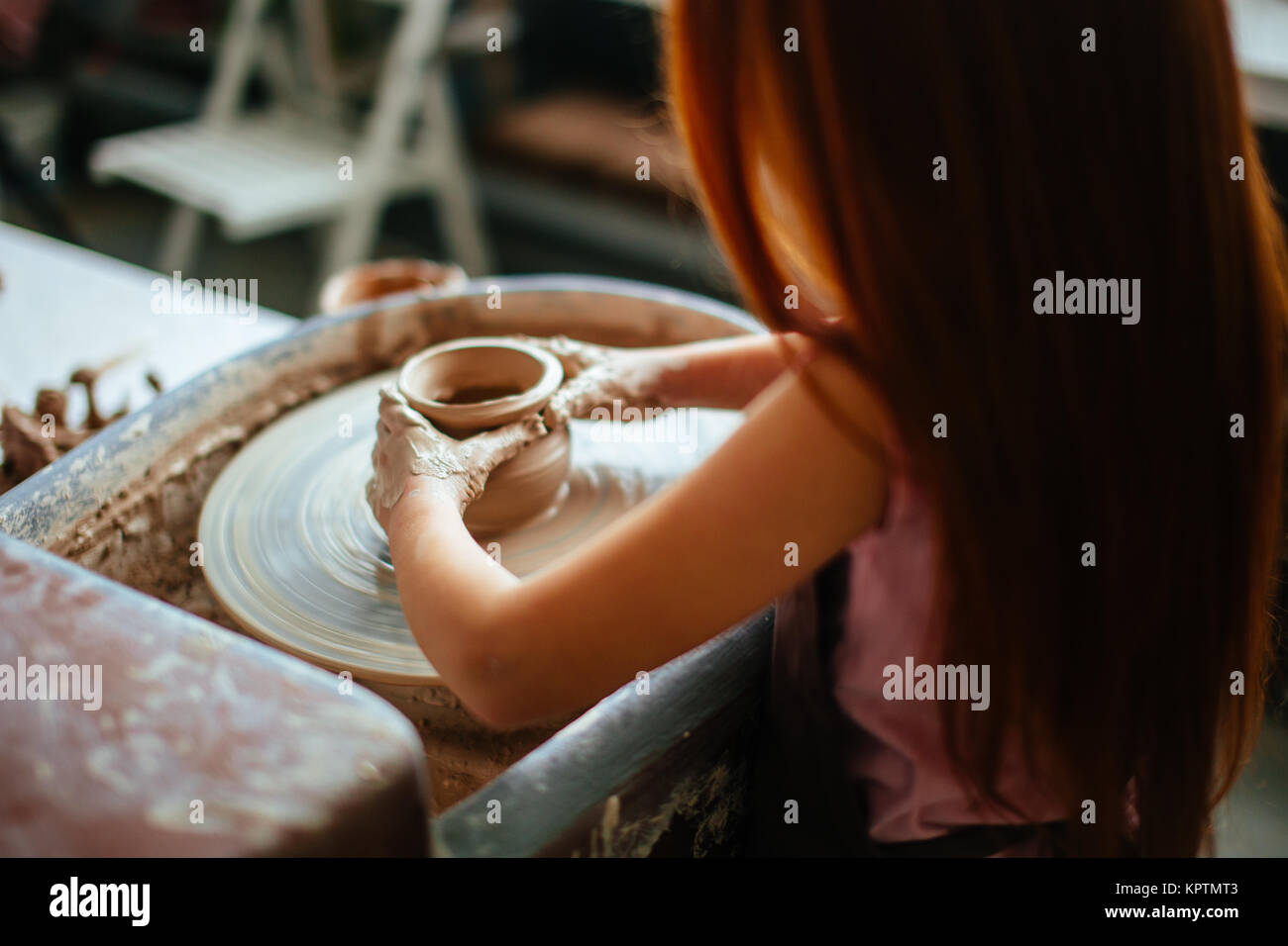 Hands of young potter, close up hands made cup on pottery wheel Stock ...
