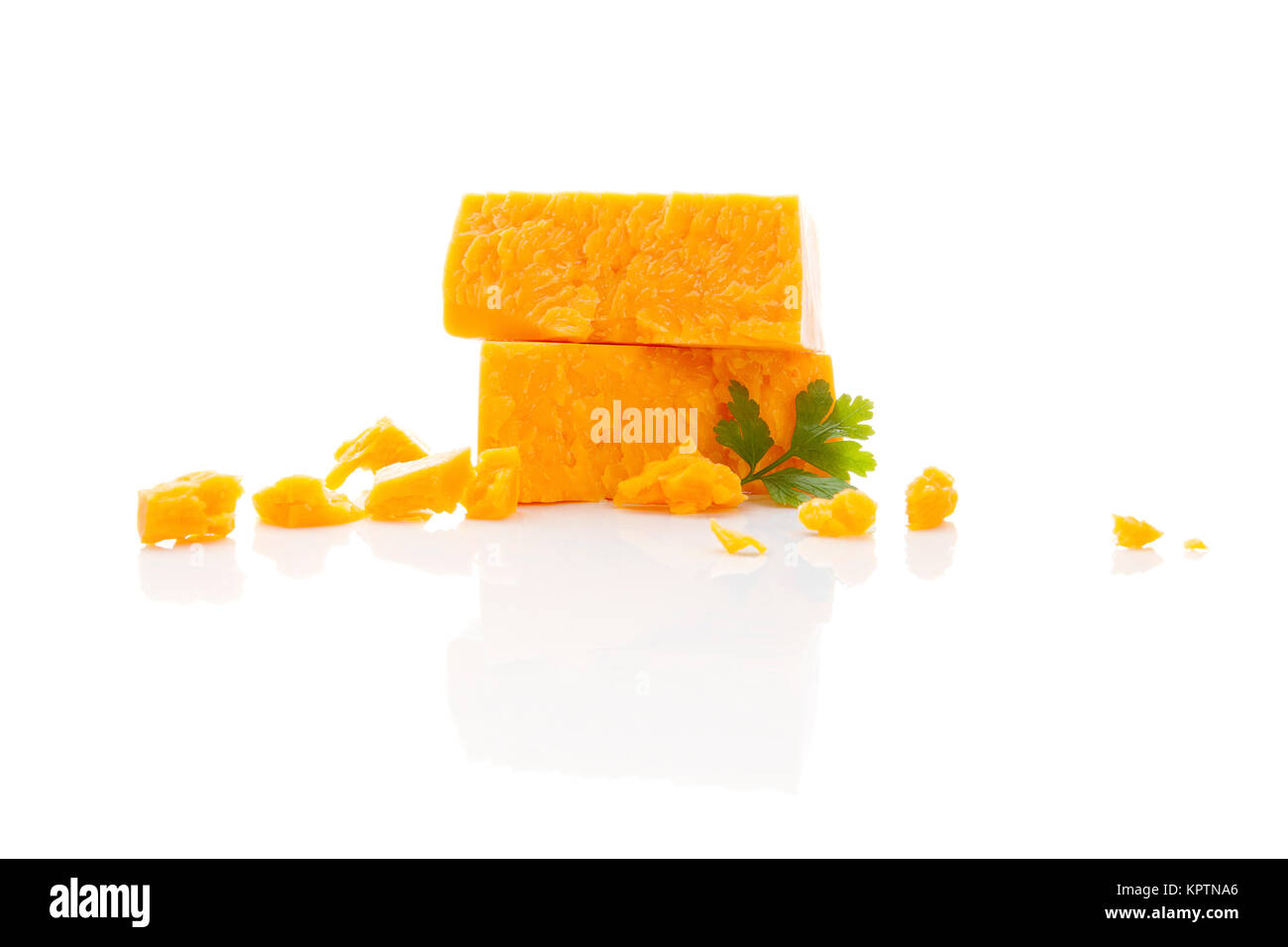 Delicious cheddar cheese isolated on white background. Culinary ...