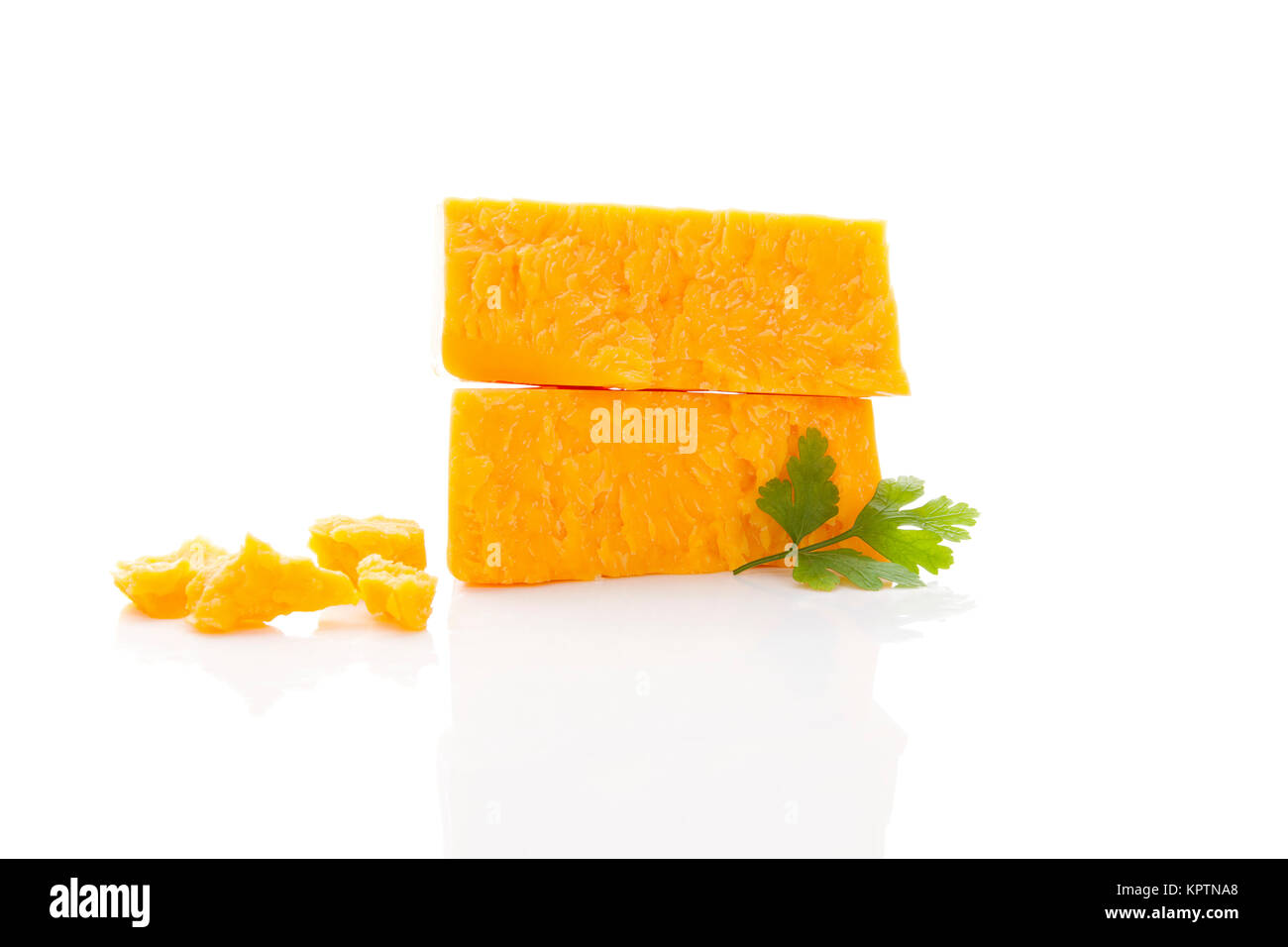 Delicious cheddar cheese isolated on white background. Culinary ...