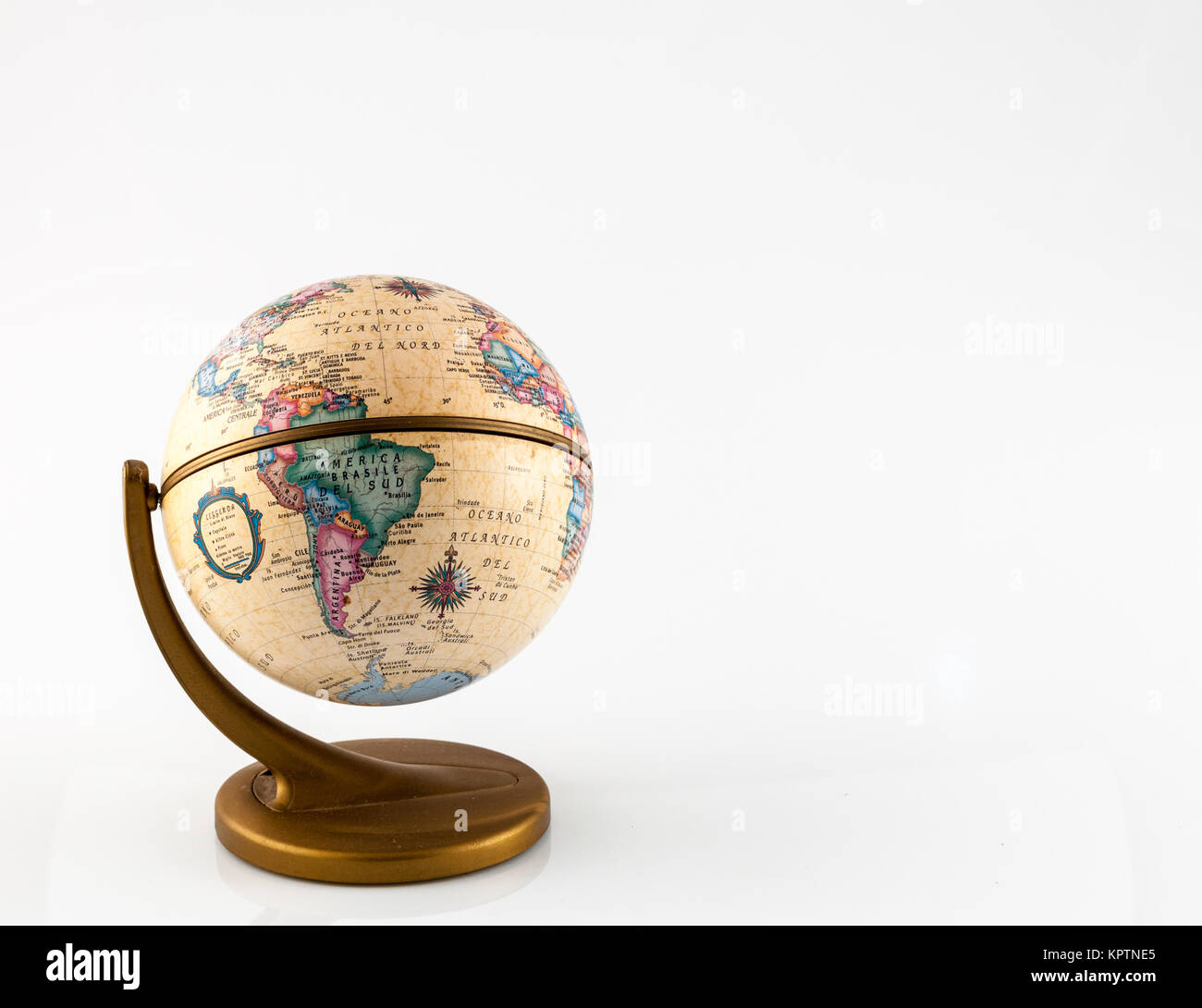 Little globe on colored background Stock Photo - Alamy