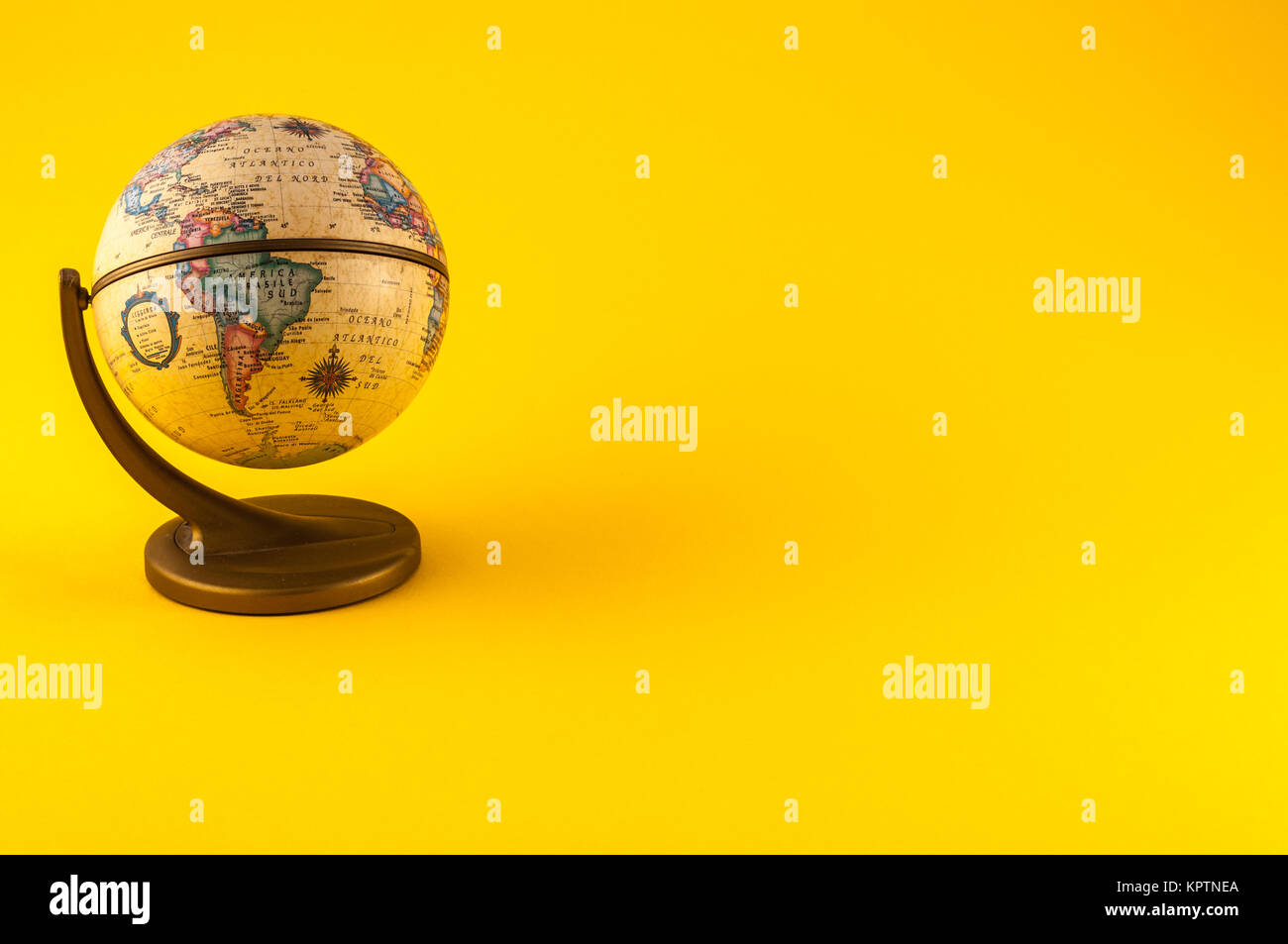 Little globe on colored background Stock Photo - Alamy