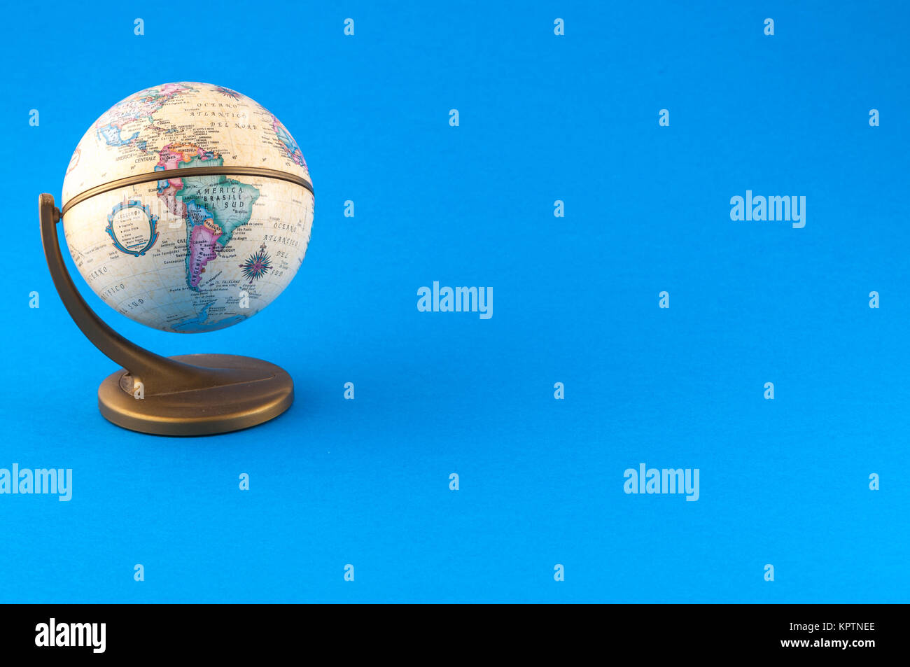 Little globe on colored background Stock Photo - Alamy