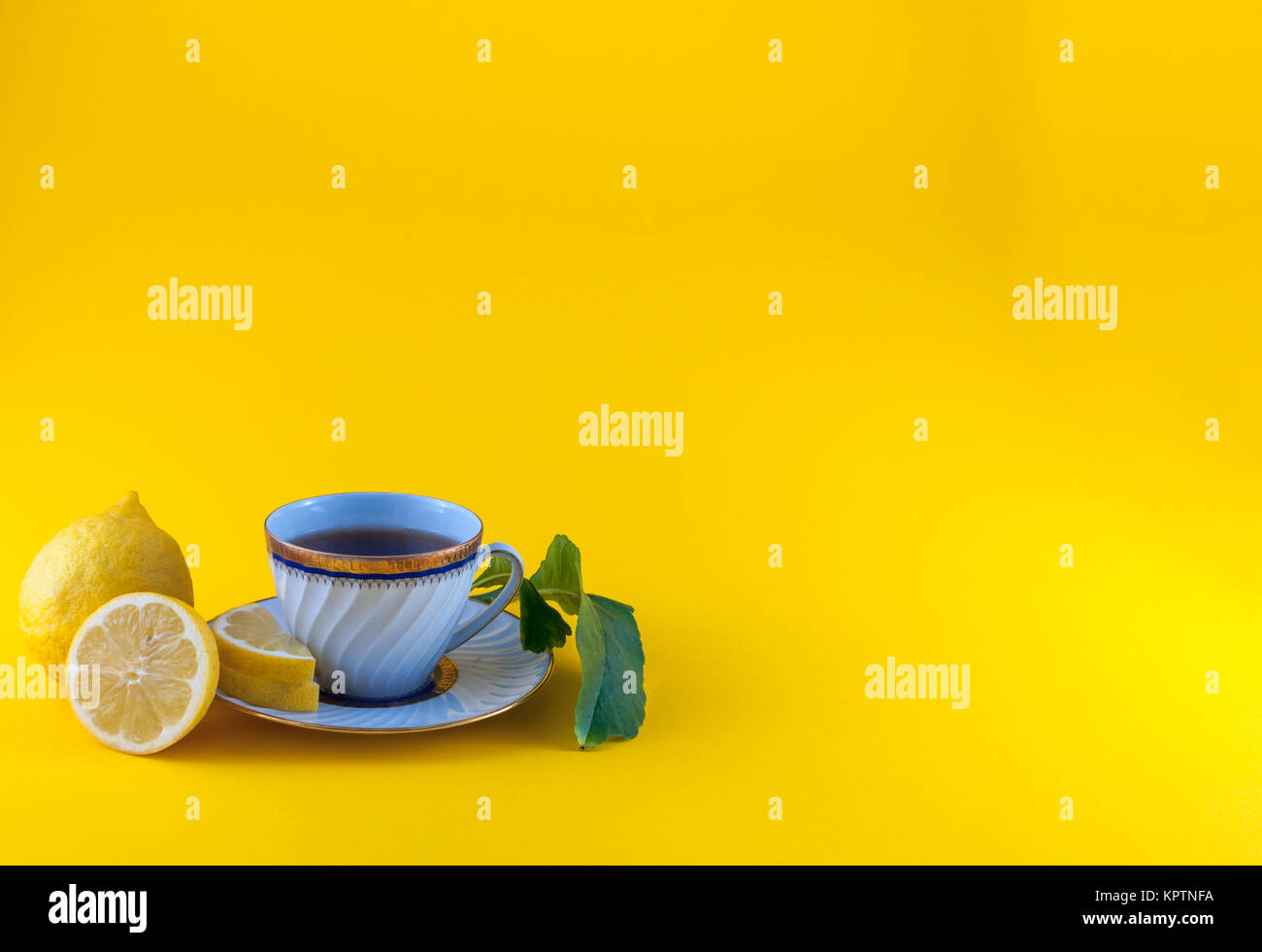 Tea cup on colored background Stock Photo - Alamy