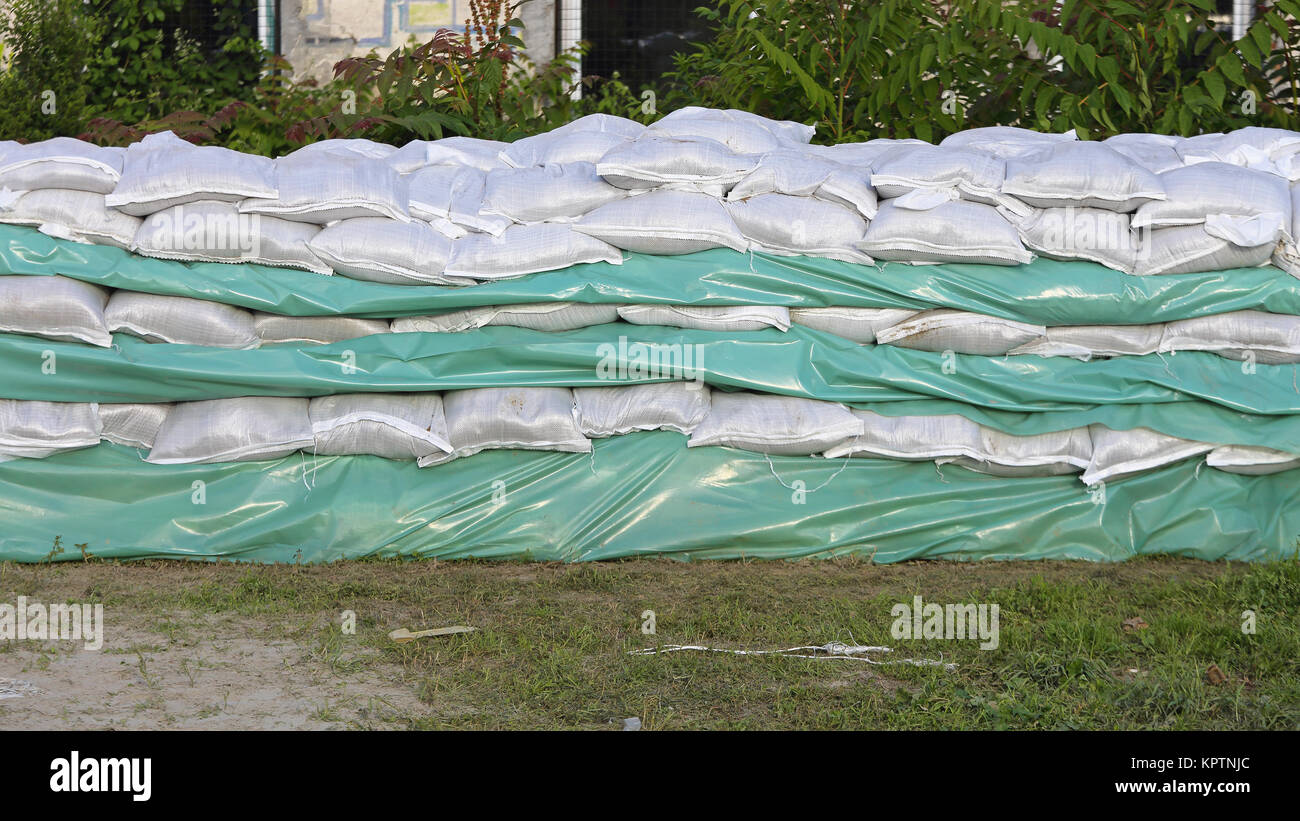 Wall of Sandbags and Tarp for Flood Protection Stock Photo - Alamy
