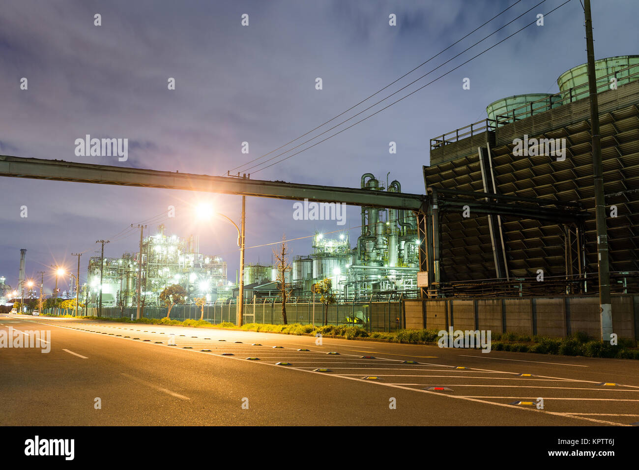 Industrial factory at night Stock Photo - Alamy