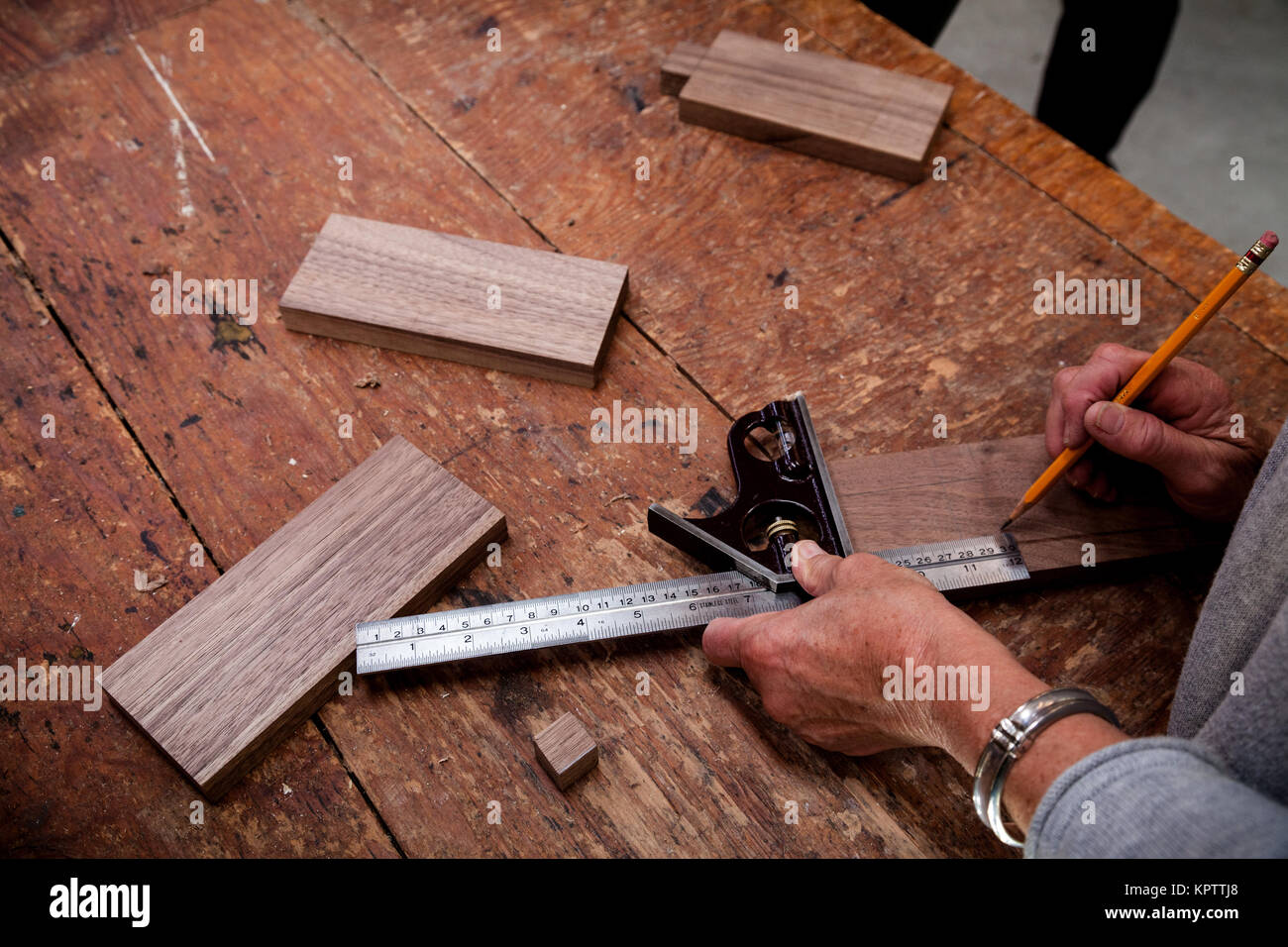 Measuring out wood for a furniture piece Stock Photo - Alamy