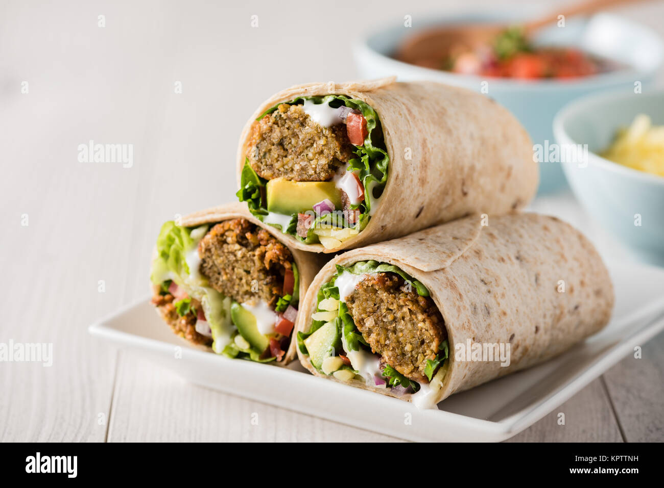 Vegetarian falafel wraps with avocado and cheese Stock Photo - Alamy