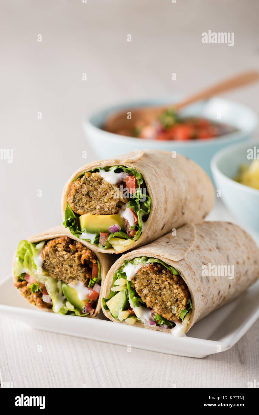 Vegetarian falafel wraps with avocado and cheese Stock Photo - Alamy