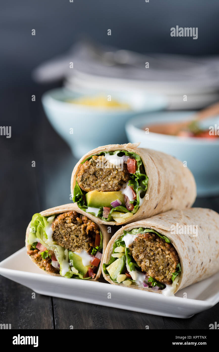 Vegetarian falafel wraps with avocado and cheese Stock Photo - Alamy